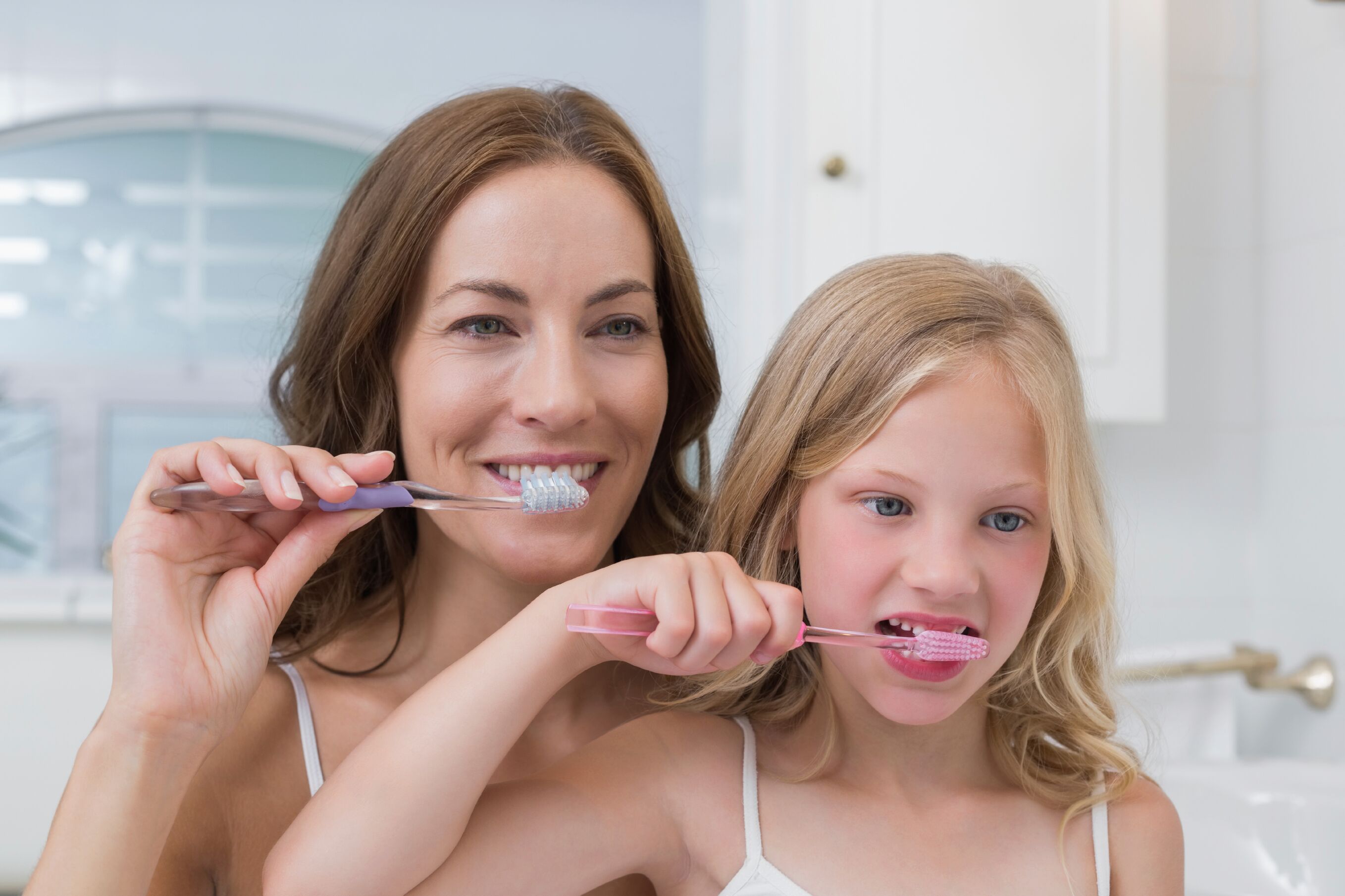 Kids Brushing Teeth Mom